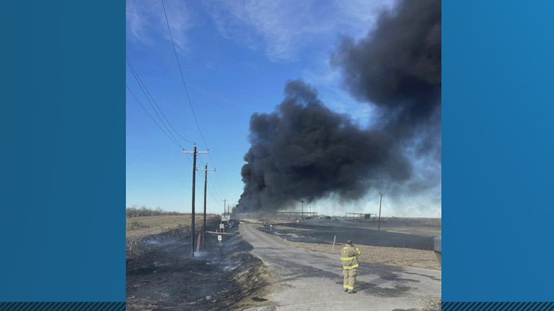 First responders battle explosion, fire at saltwater disposal fac ...
