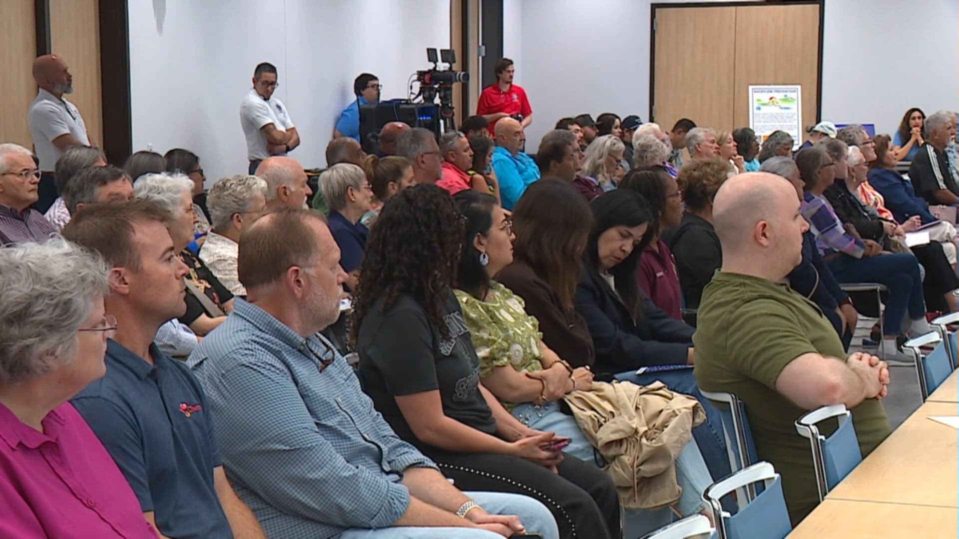 Residents question water future as officials defend desal delay at ...