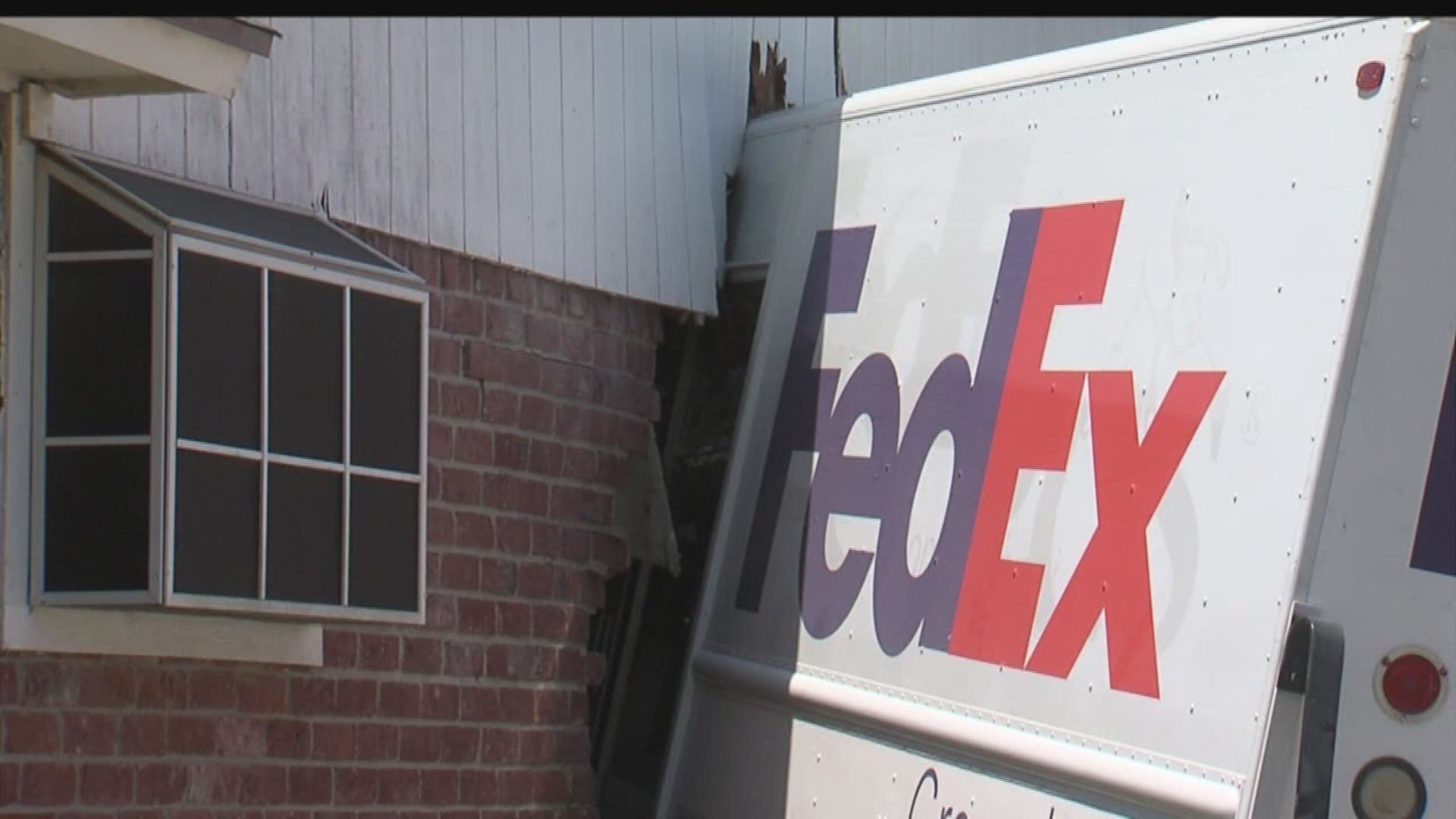 FedEx truck crashes into southside home, two taken to hospital | kiiitv.com