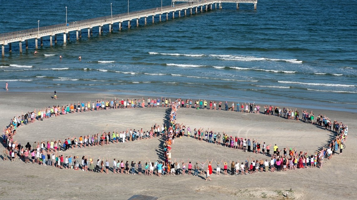 2023 Human peace sign in Port Aransas | kiiitv.com