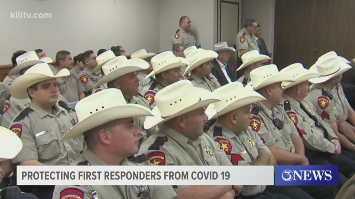 First responders dealing with COVID-19 precautions while protecting the ...