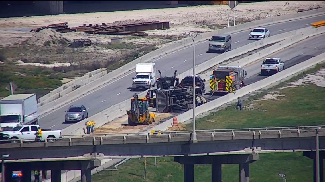 WATCH: Crews cleaning up sand spill after 18-wheeler after accident ...
