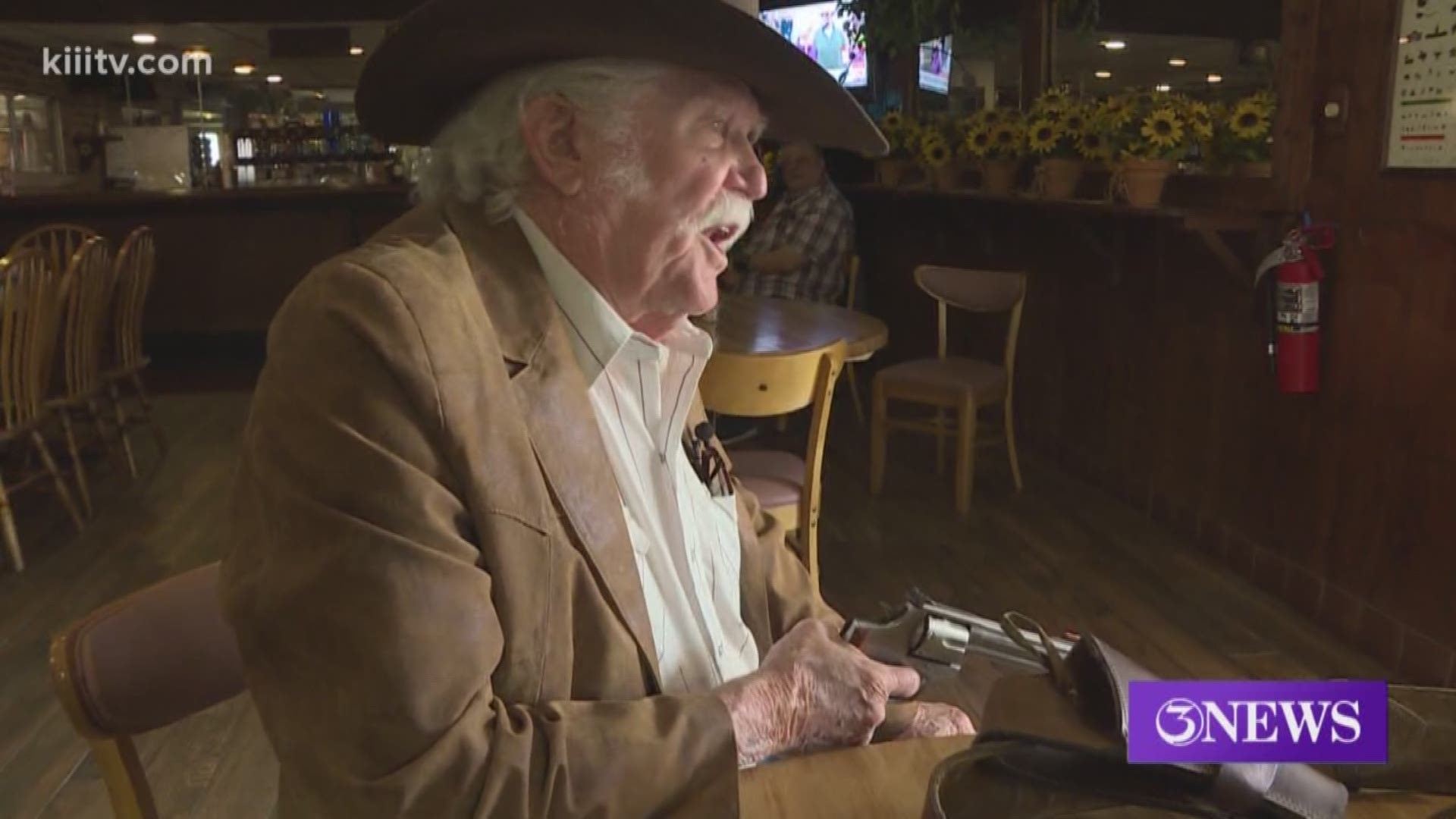 Western movie star Don Collier signing autographs in Mathis, Texas ...